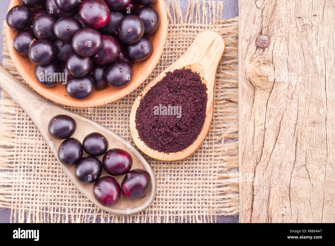berries and acai powder, fruit of Amazonian origin Stock Photo - Alamy