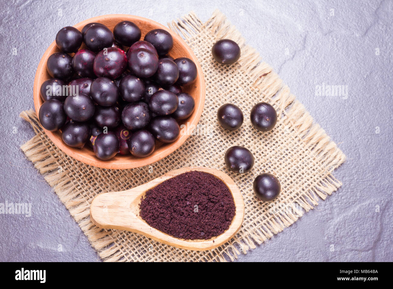 berries and acai powder, fruit of Amazonian origin Stock Photo - Alamy