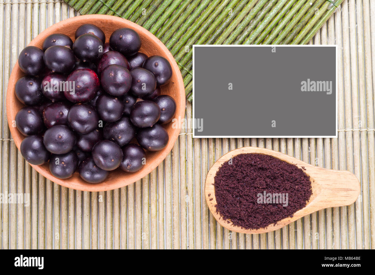 berries and acai powder, fruit of Amazonian origin Stock Photo - Alamy