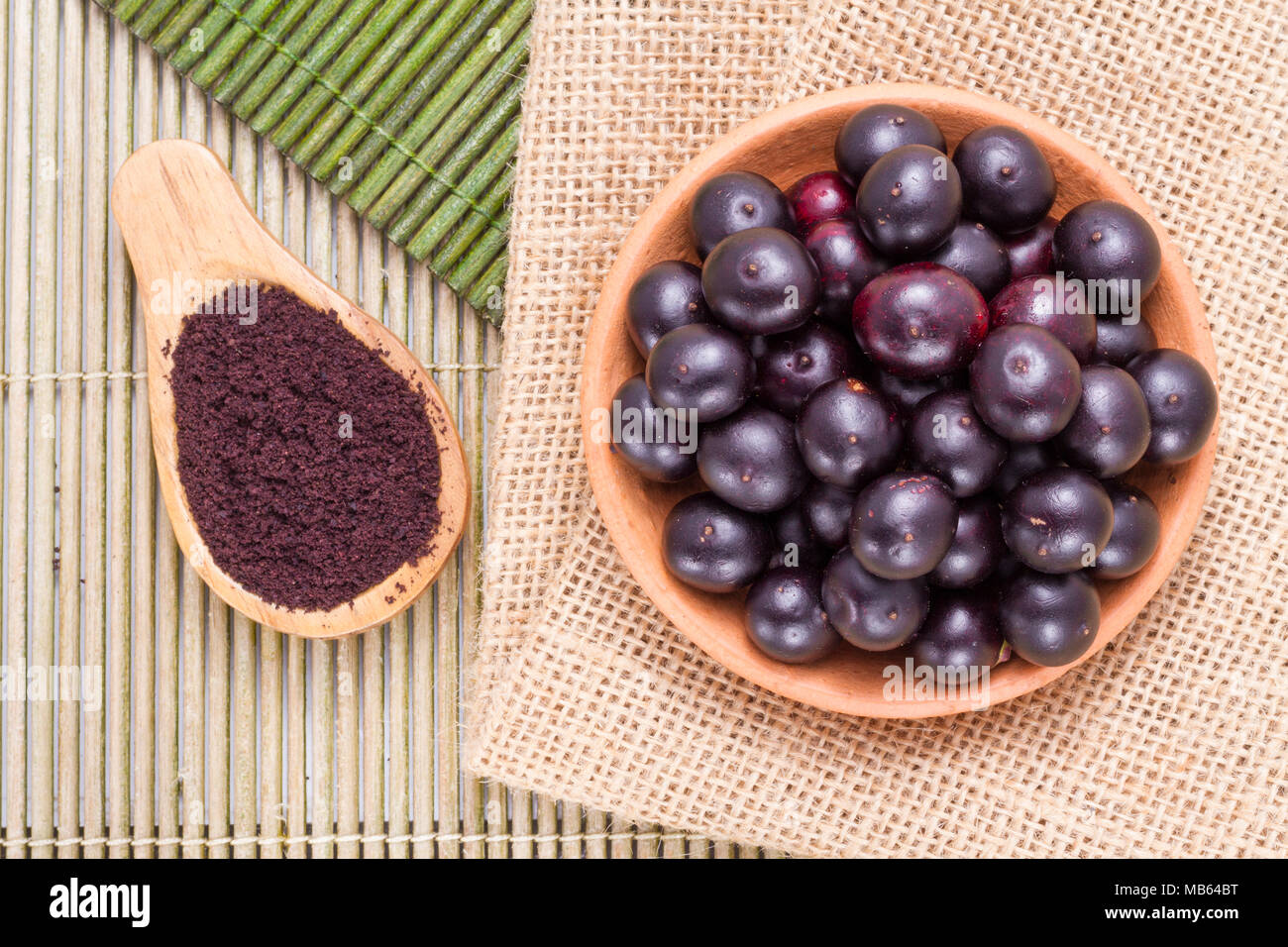 berries and acai powder, fruit of Amazonian origin Stock Photo - Alamy