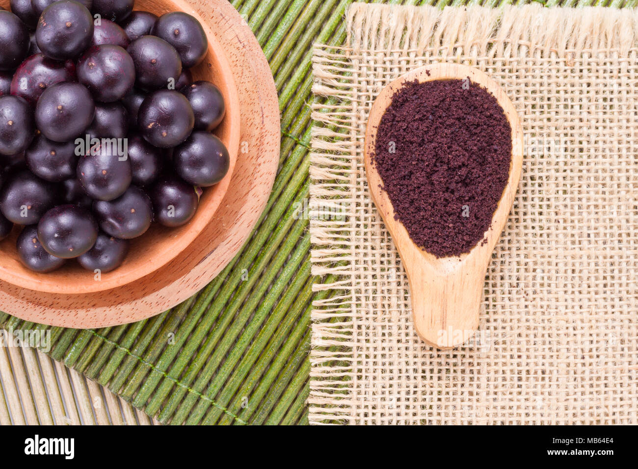 berries and acai powder, fruit of Amazonian origin Stock Photo - Alamy