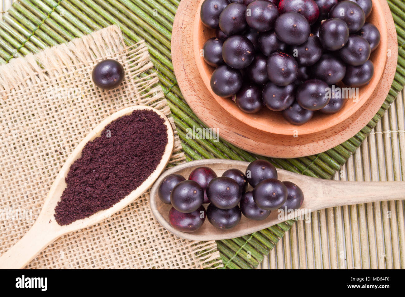 berries and acai powder, fruit of Amazonian origin Stock Photo - Alamy