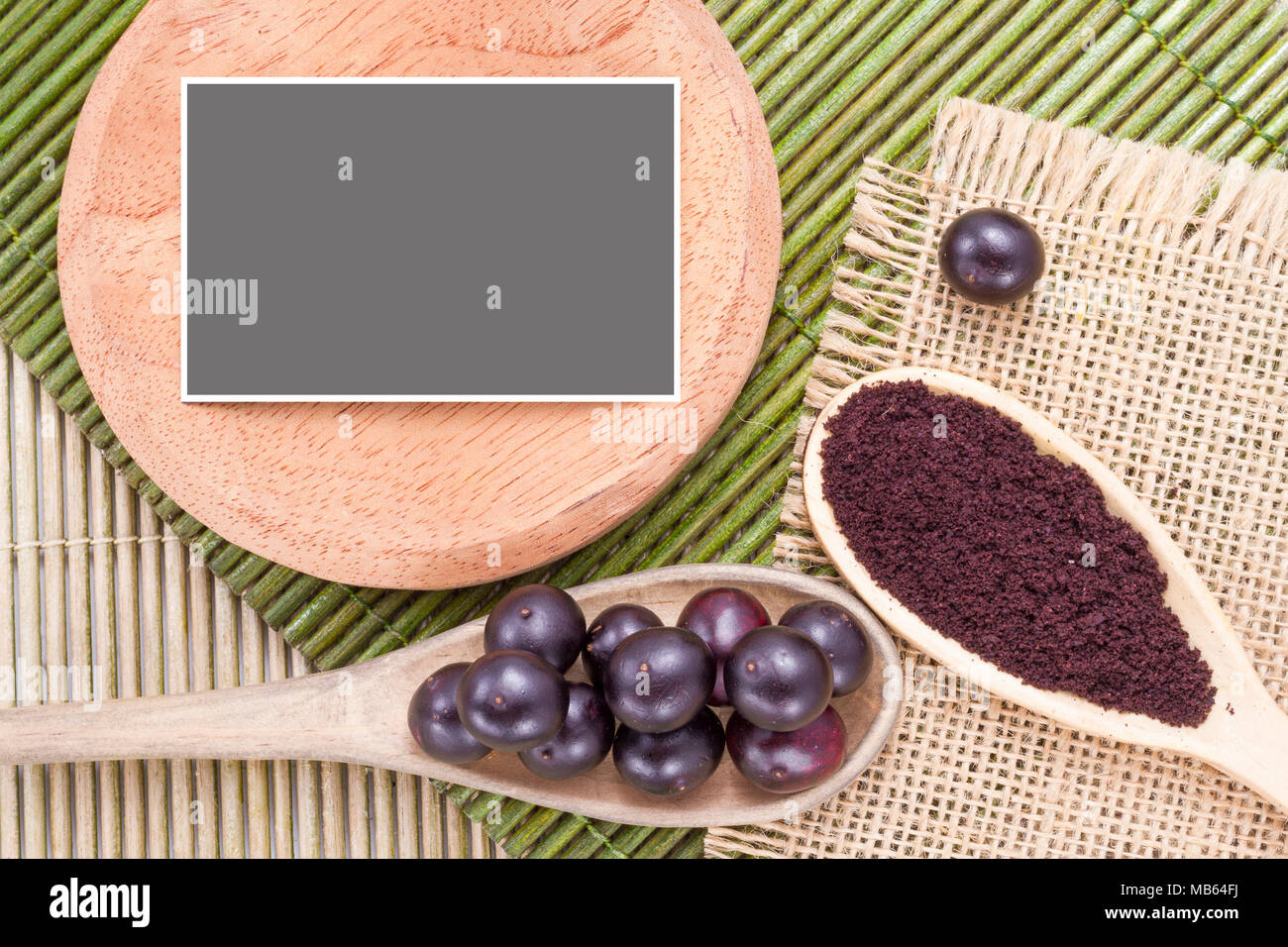 berries and acai powder, fruit of Amazonian origin Stock Photo - Alamy