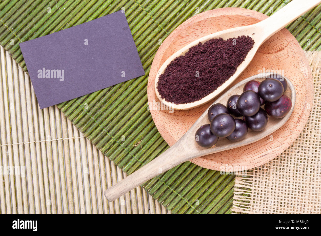 berries and acai powder, fruit of Amazonian origin Stock Photo - Alamy