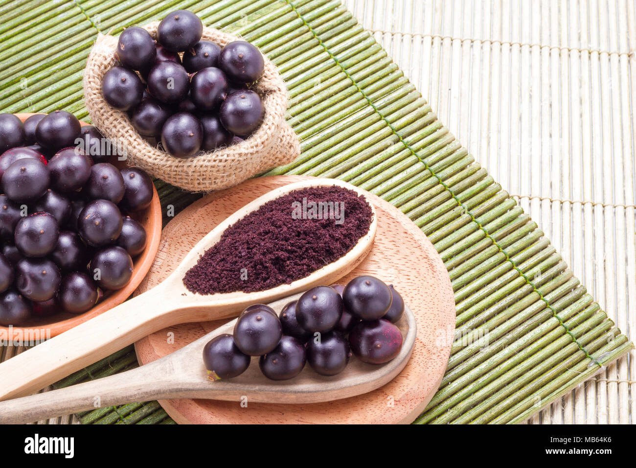 berries and acai powder, fruit of Amazonian origin Stock Photo - Alamy