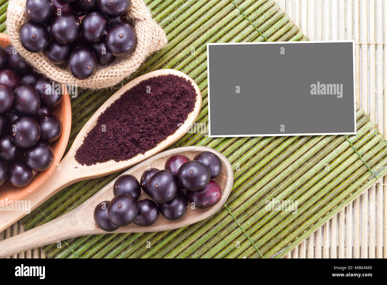 berries and acai powder, fruit of Amazonian origin Stock Photo - Alamy