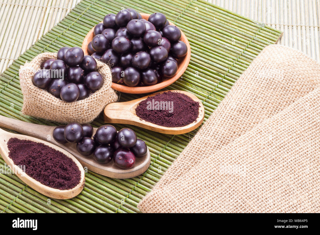 berries and acai powder, fruit of Amazonian origin Stock Photo - Alamy