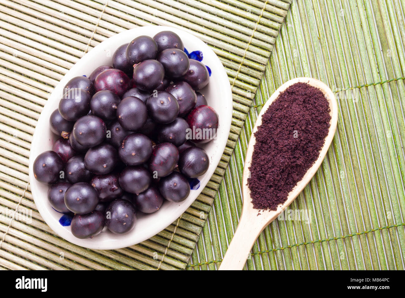 berries and acai powder, fruit of Amazonian origin Stock Photo - Alamy
