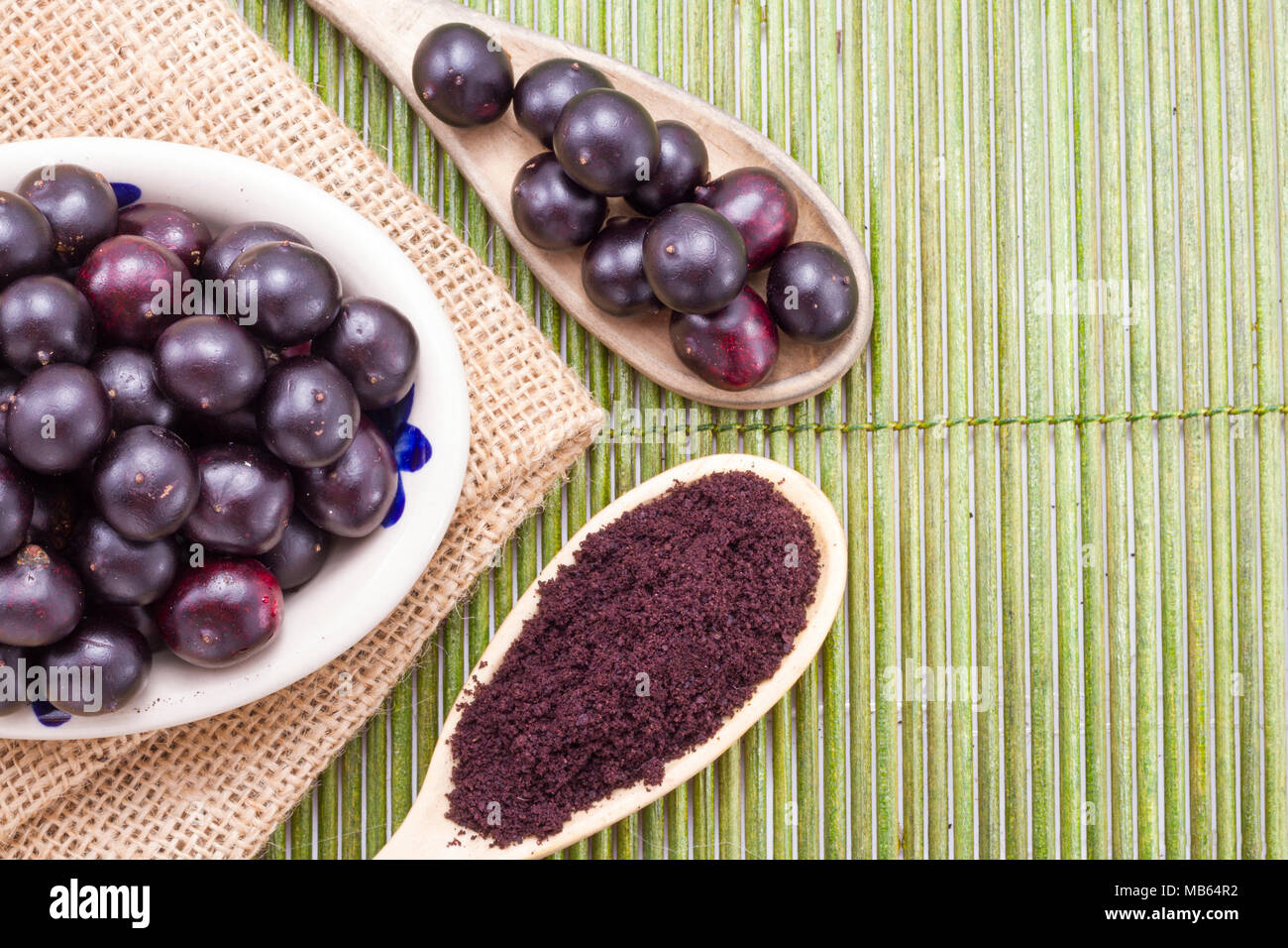 berries and acai powder, fruit of Amazonian origin Stock Photo - Alamy