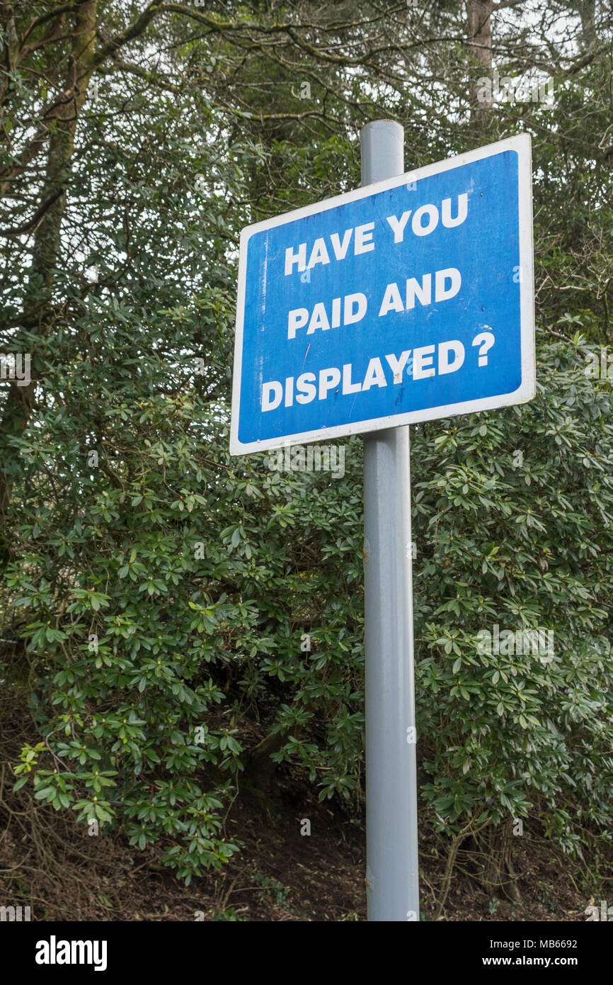 Sign at a car park reminding car owners it is a 'Pay and Display ...