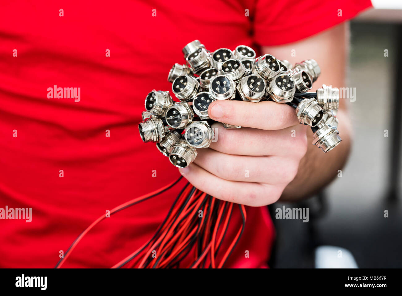 metal electrical connectors with thread in the hand Stock Photo - Alamy