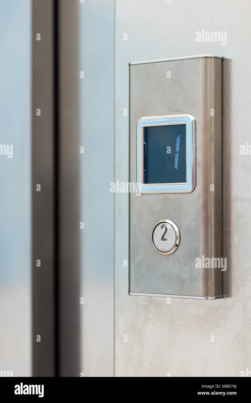 metal elevator button with electronic display Stock Photo - Alamy