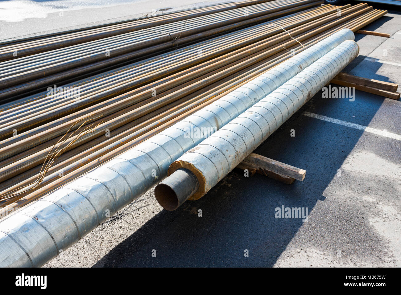 metal pipes with thermal insulation in production Stock Photo - Alamy