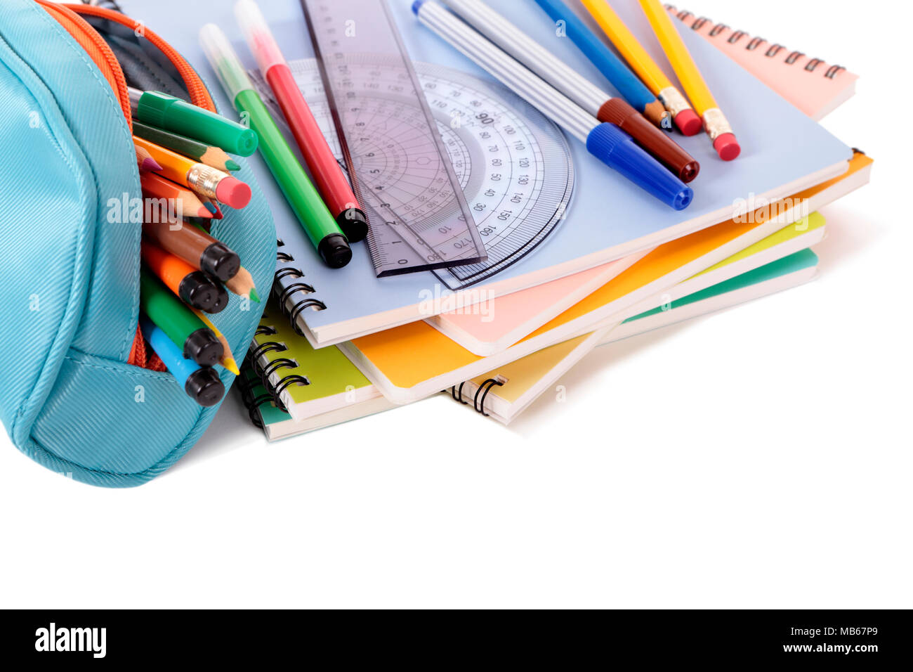 Various school supplies including notebooks and pencil case isolated ...
