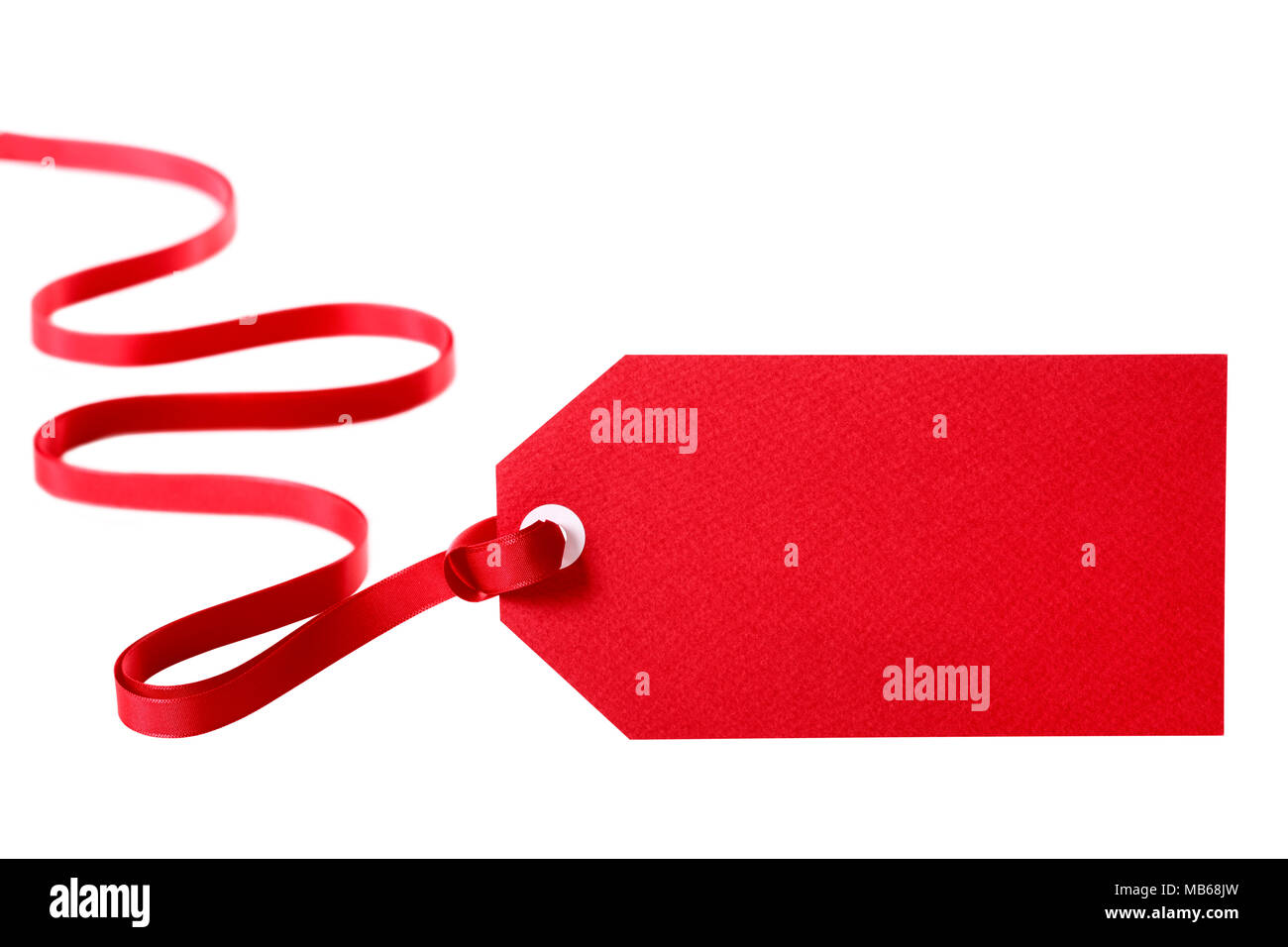 Red gift tag with red ribbon isolated on white Stock Photo - Alamy
