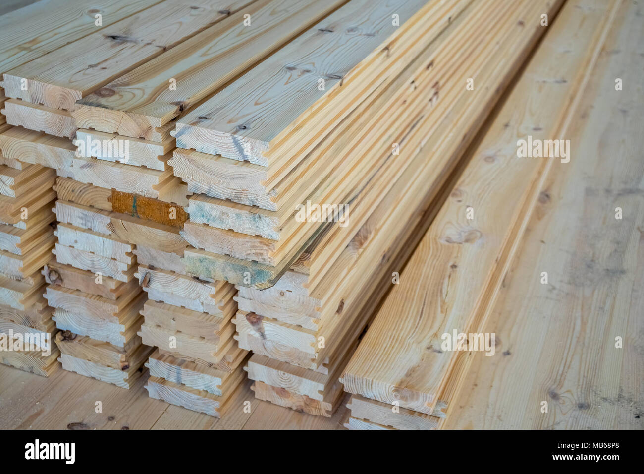 material for a floor from a tree of a larch Stock Photo - Alamy
