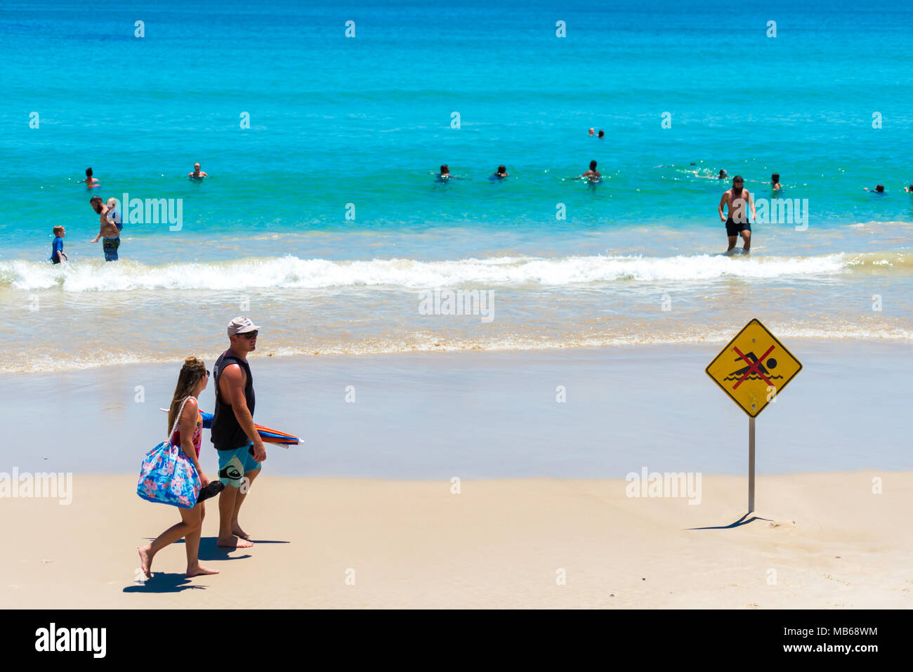 Byron Bay, NSW, Australia- January 3, 2018: People enjoying the sunny ...