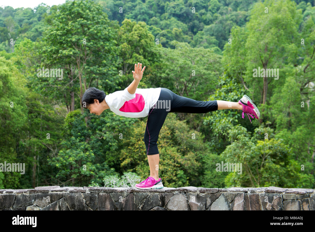 Woman looking balance in hi-res stock photography and images - Alamy