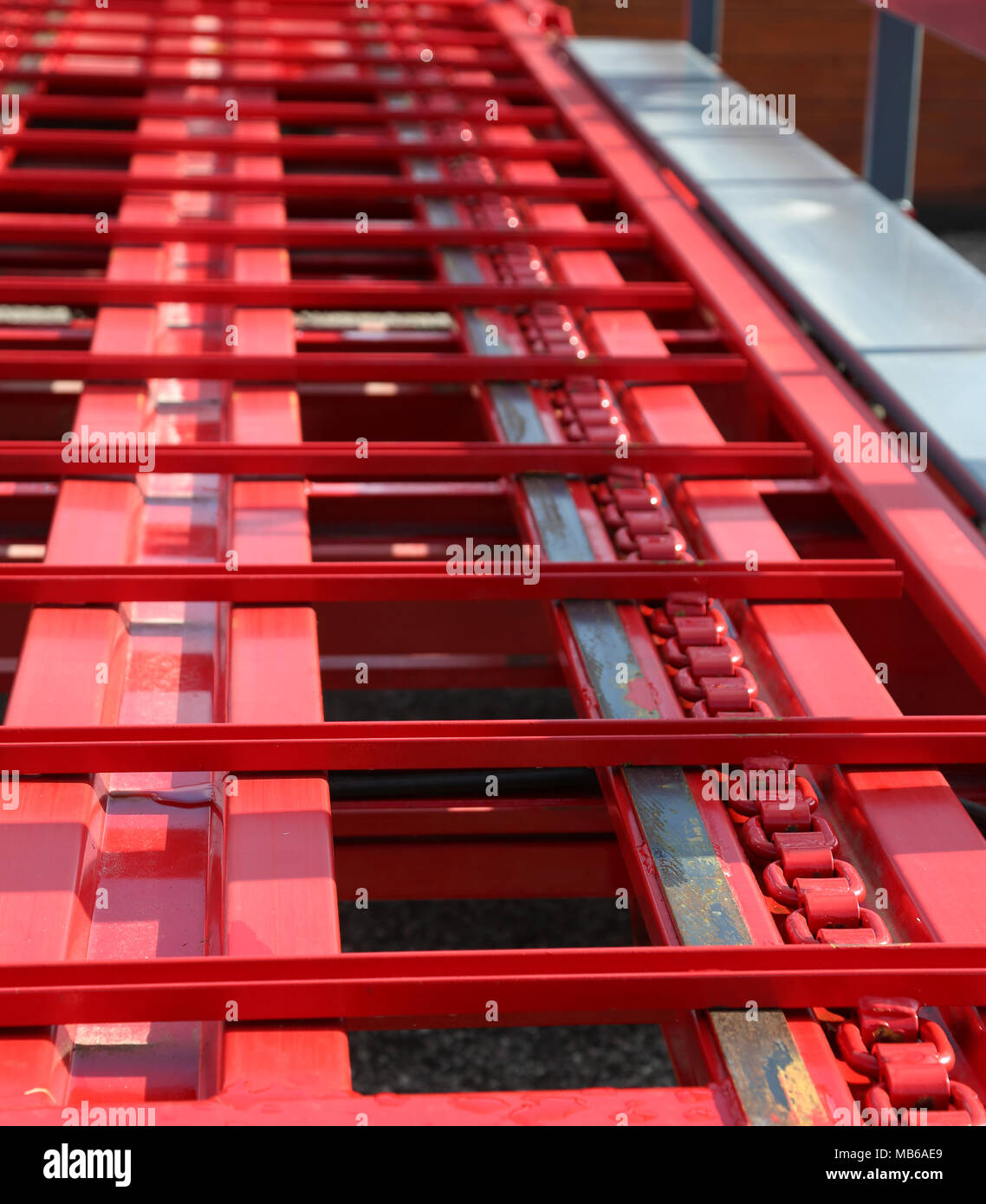 big red conveyor belt in an international shipping industry Stock Photo ...