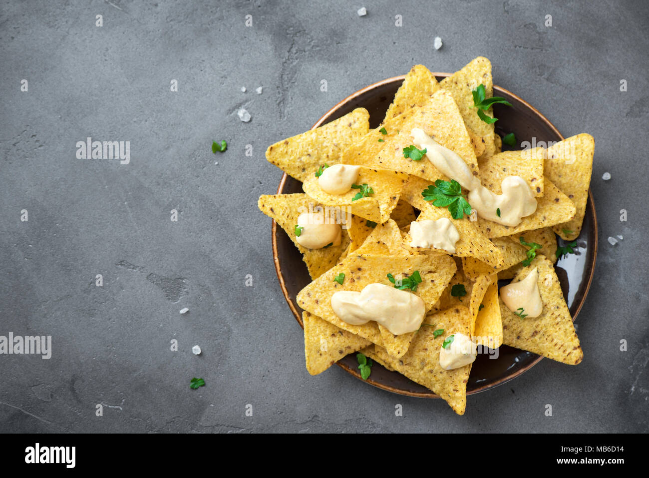 Nachos chips and melted cheese. Tortilla corn mexican nachos chips in ...