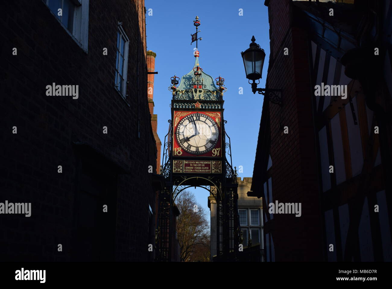 Chester's Eastgate clock soaking in the morning sunshine Stock Photo ...