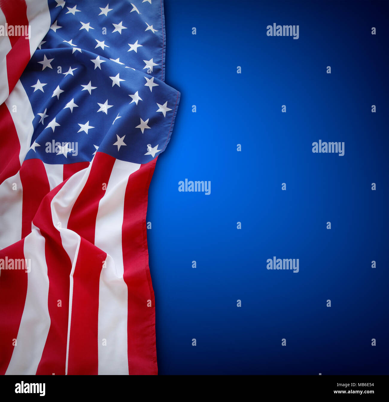 American flag on blue background Stock Photo - Alamy