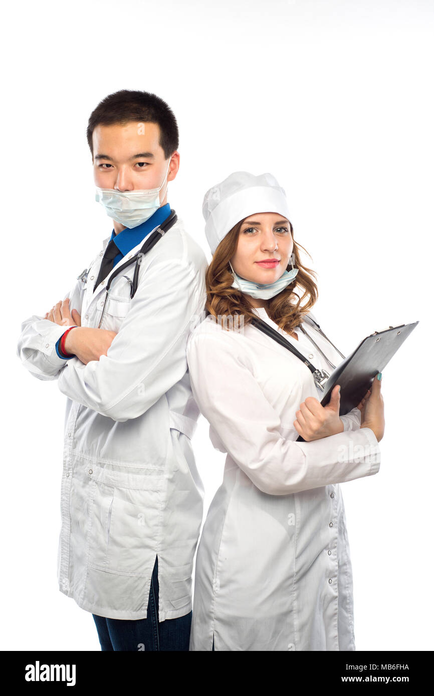 Doctor standing back hi-res stock photography and images - Alamy
