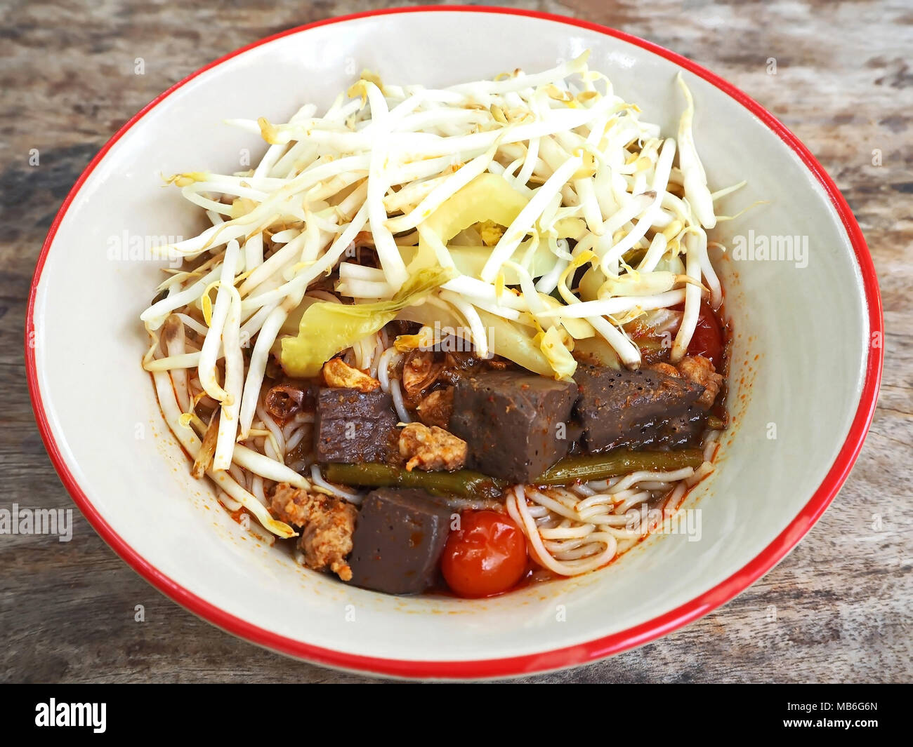 Traditional Rice Noodles Soup with Chicken Blood, Sliced Tomatoes and ...