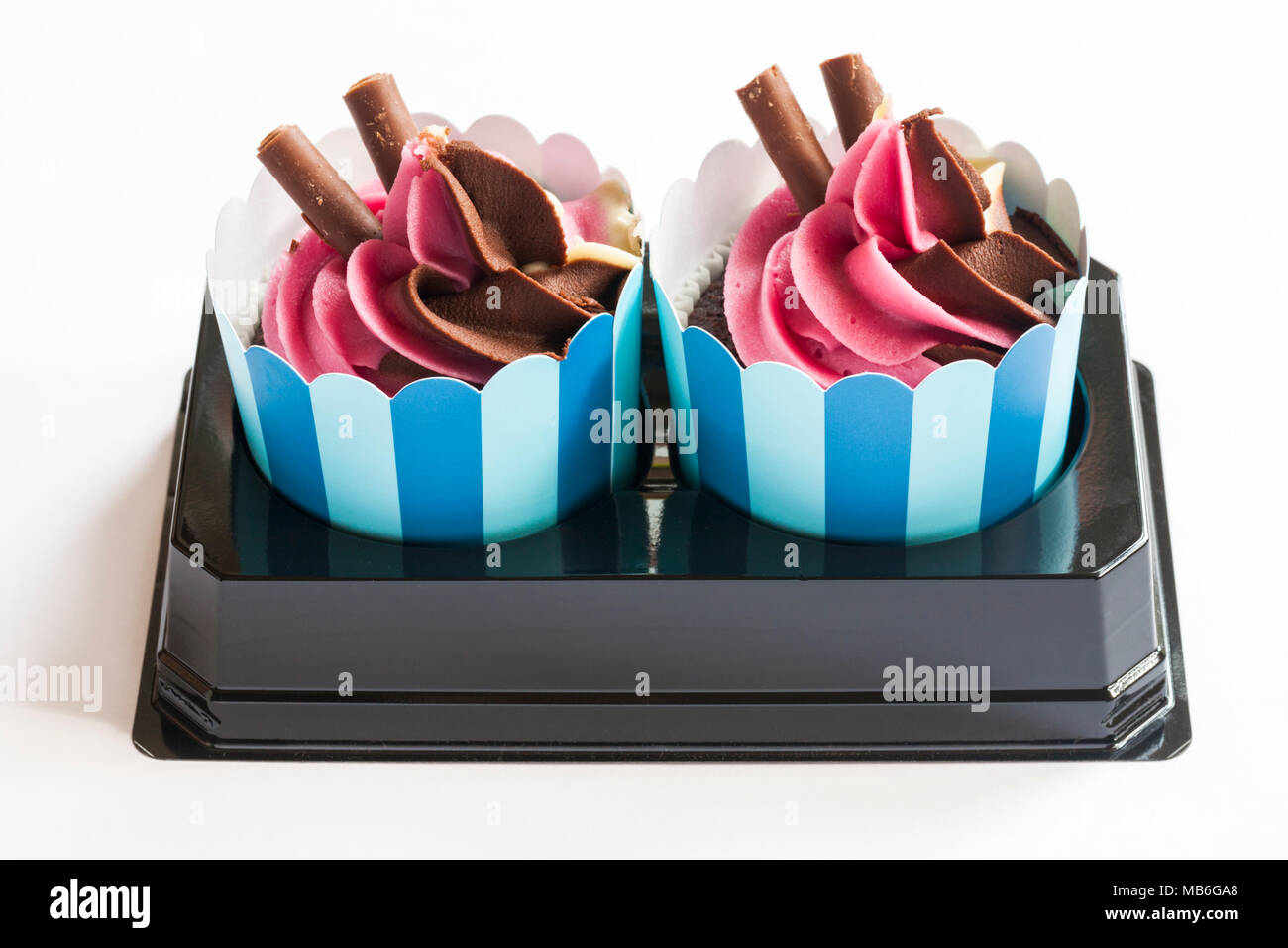 Two M&S Neapolitan Sundae Cakes in plastic tray packaging isolated on ...