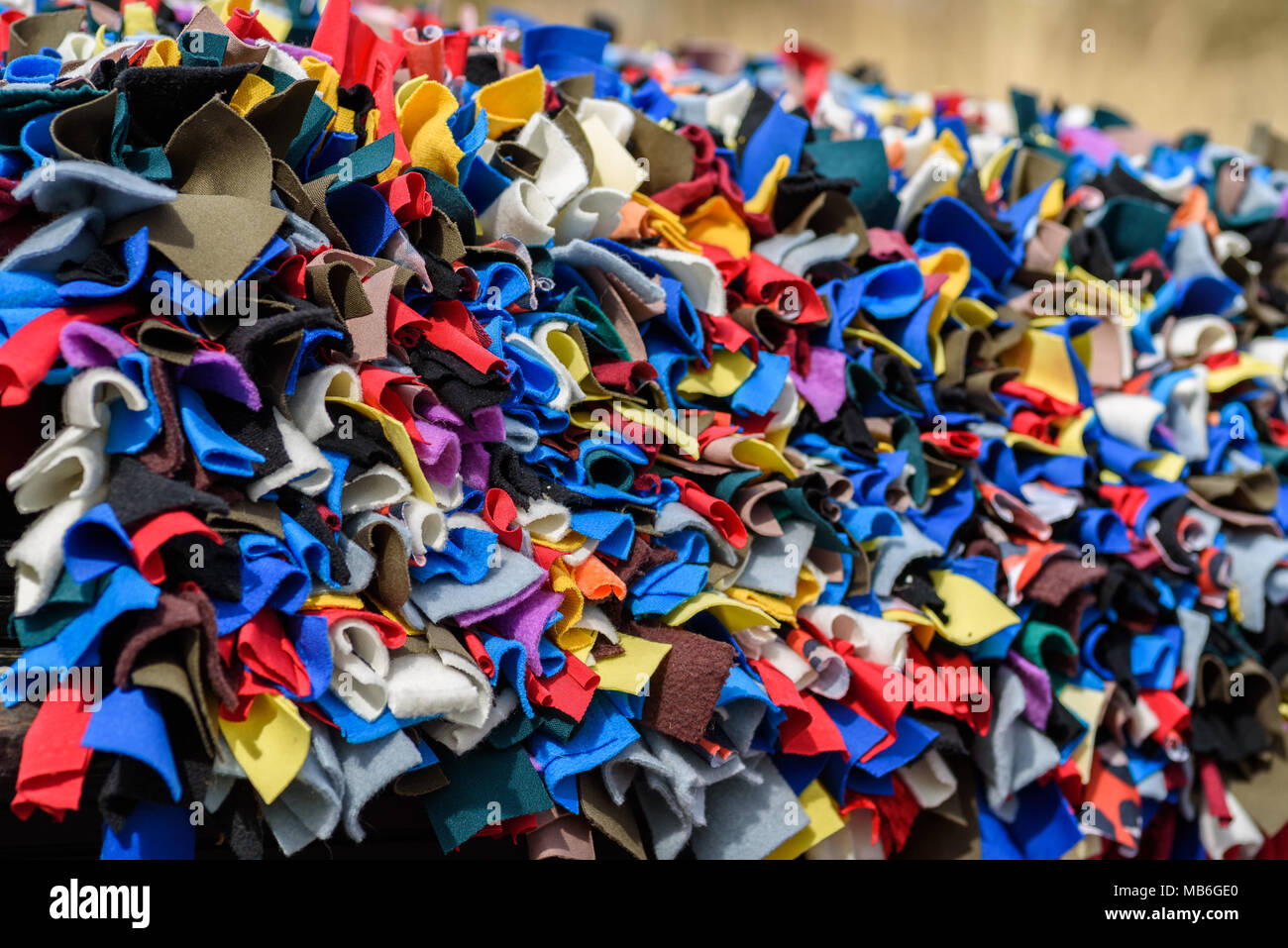 Detail of a colourful rag rug Stock Photo - Alamy