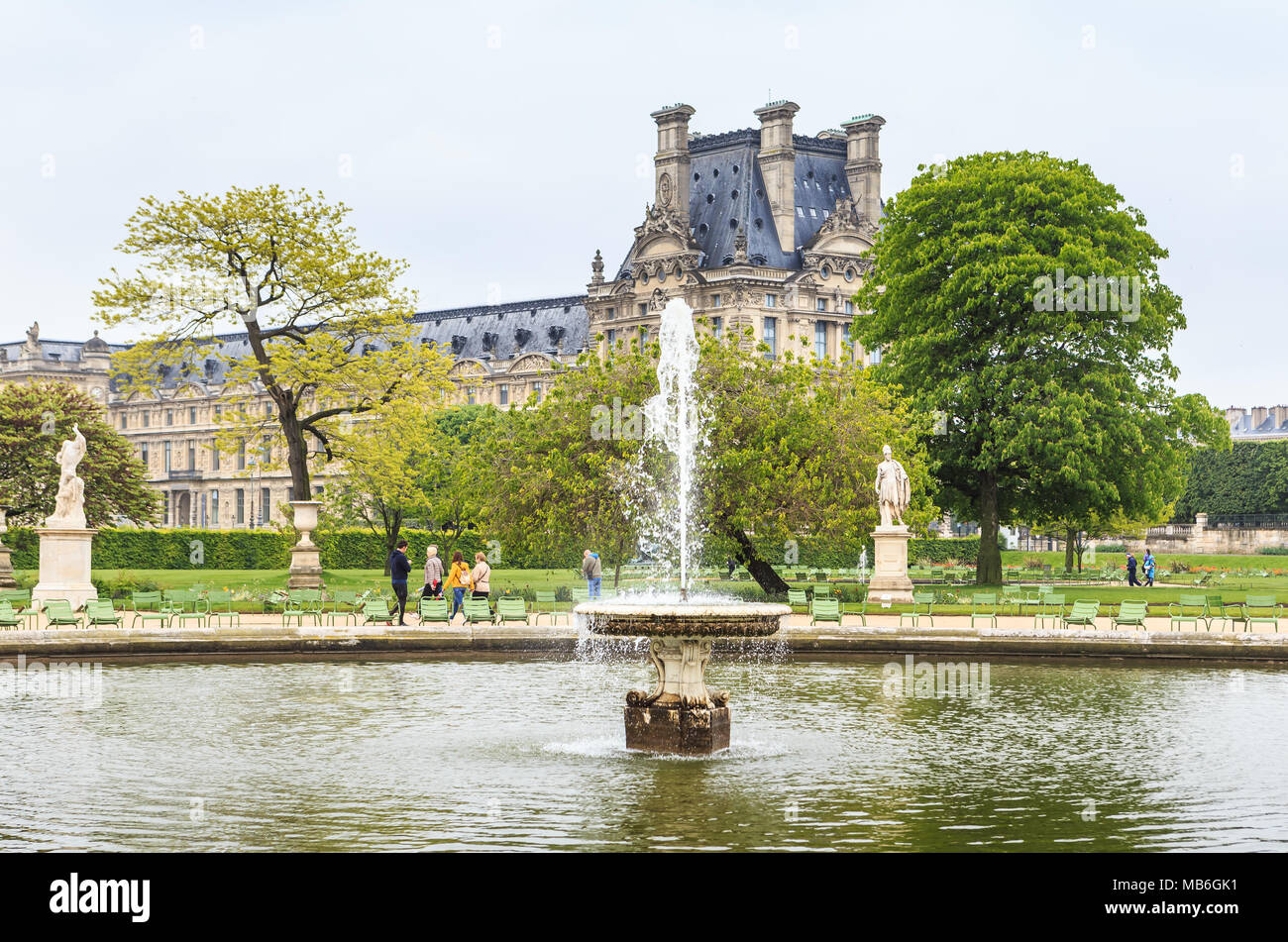 View of Louvre building from Tuileries garden. Louvre Museum is one of ...