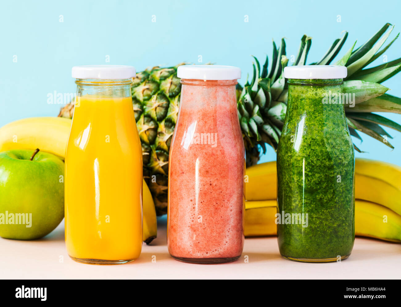 Colorful smoothies in bottles. Natural Organic Food Style Stock Photo ...