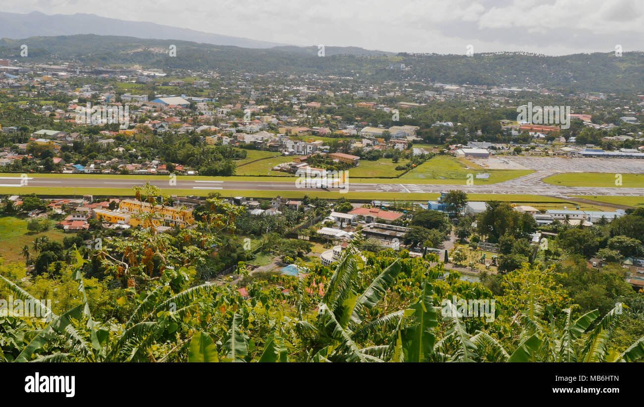 Panorama of the city of Legazpi on the background of the airport. Luzon ...
