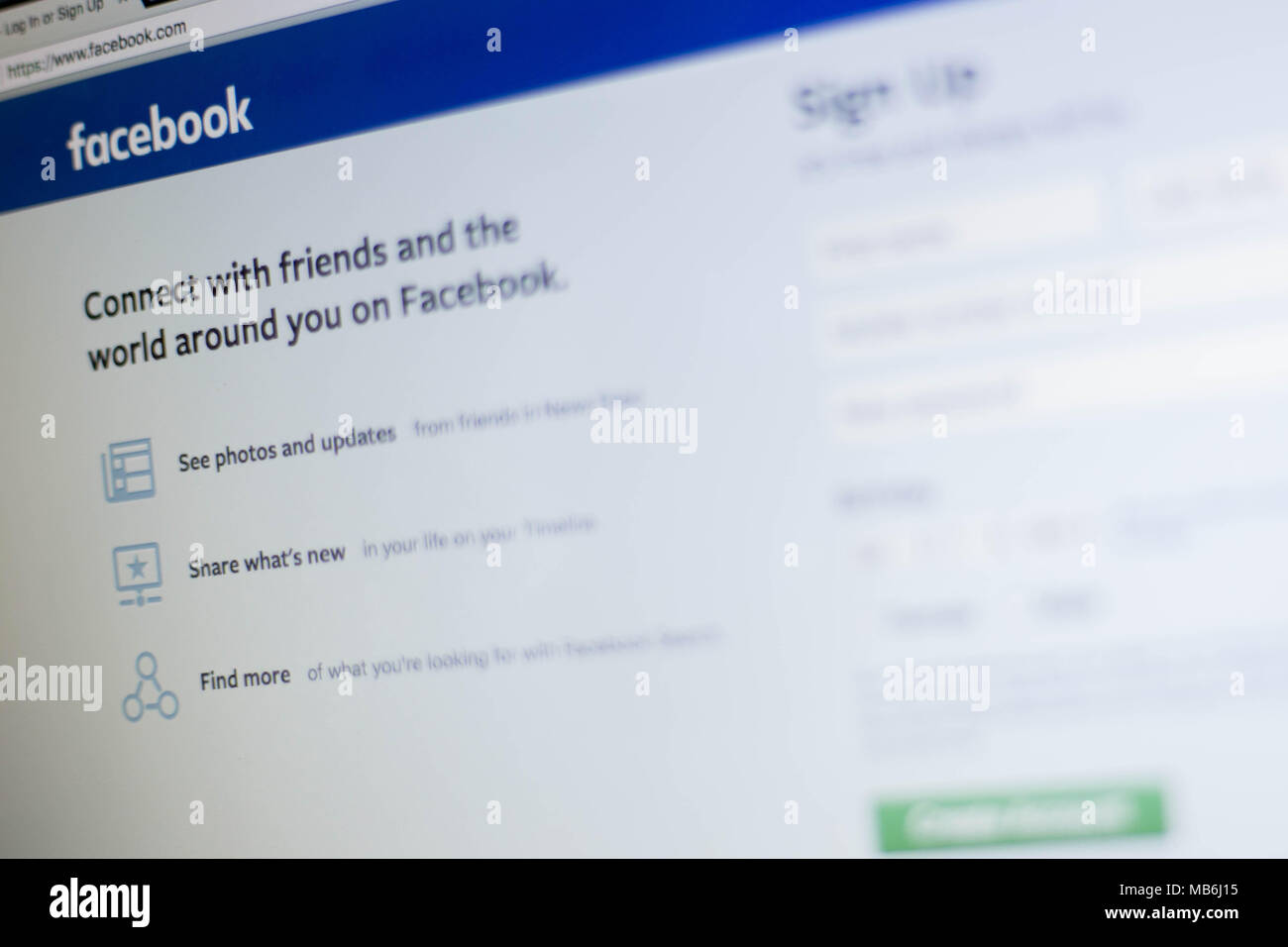In a photo illustration, the home page of the Facebook website is seen ...