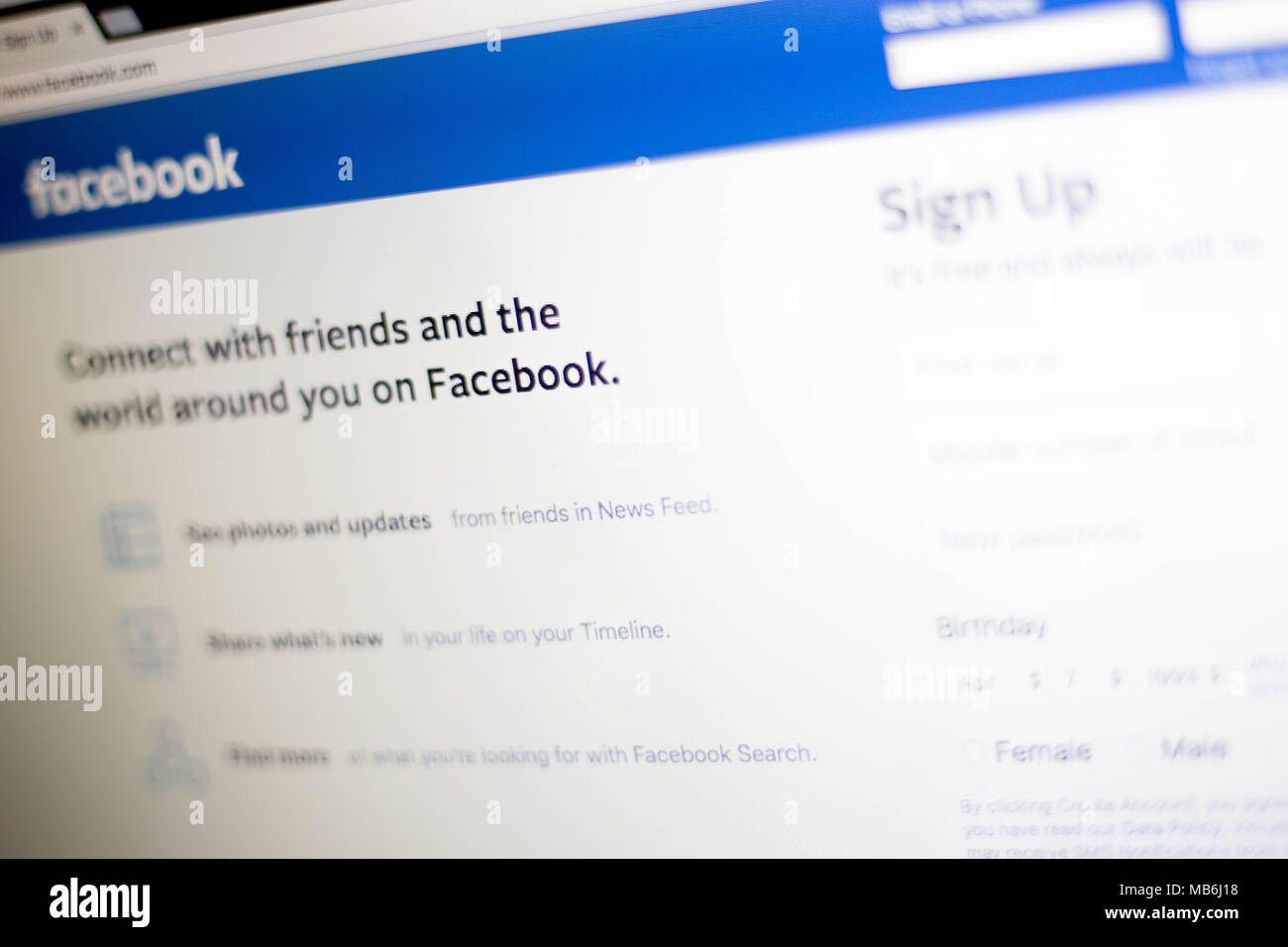In a photo illustration, the home page of the Facebook website is seen ...