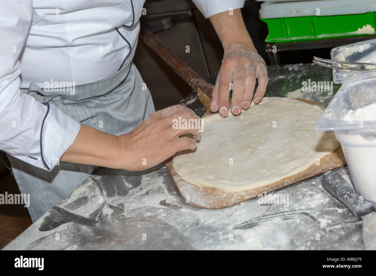 Chef preparing pizza base hi-res stock photography and images - Alamy