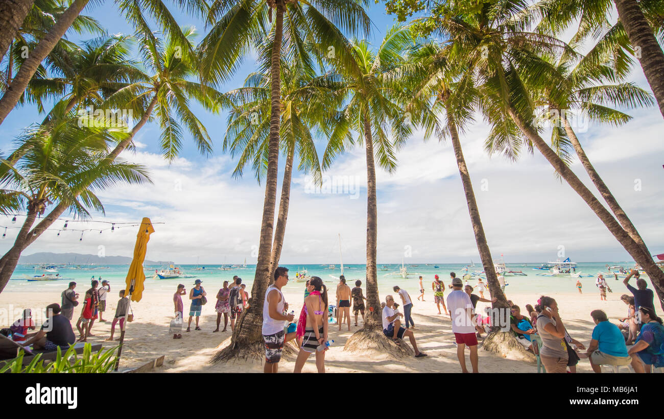 BORACAY, PHILIPPINES - JANUARY 7, 2018 - Tourists relaxing on the ...