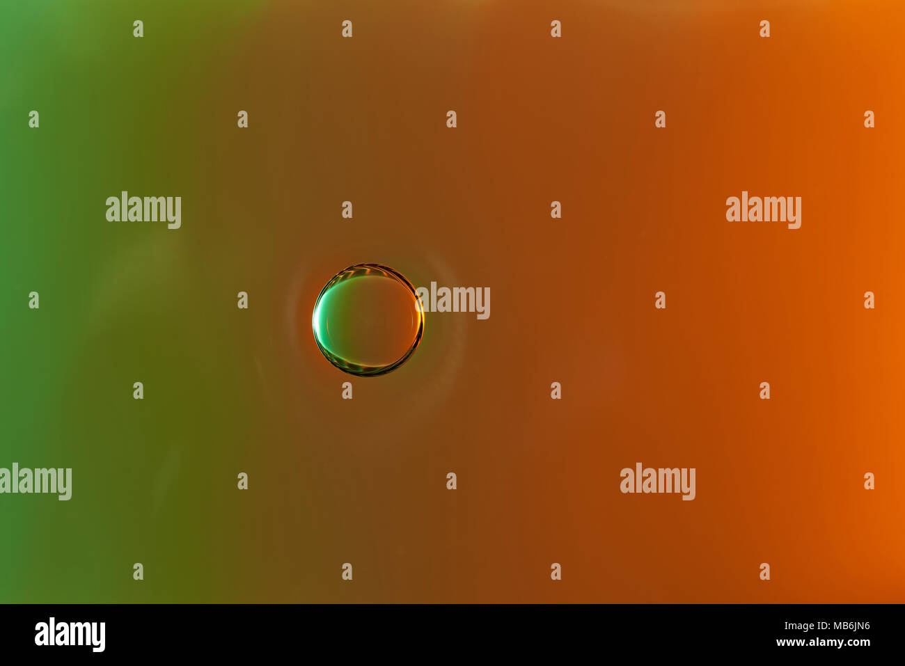 One air bubble on water surface. Closeup of round water drop Stock ...