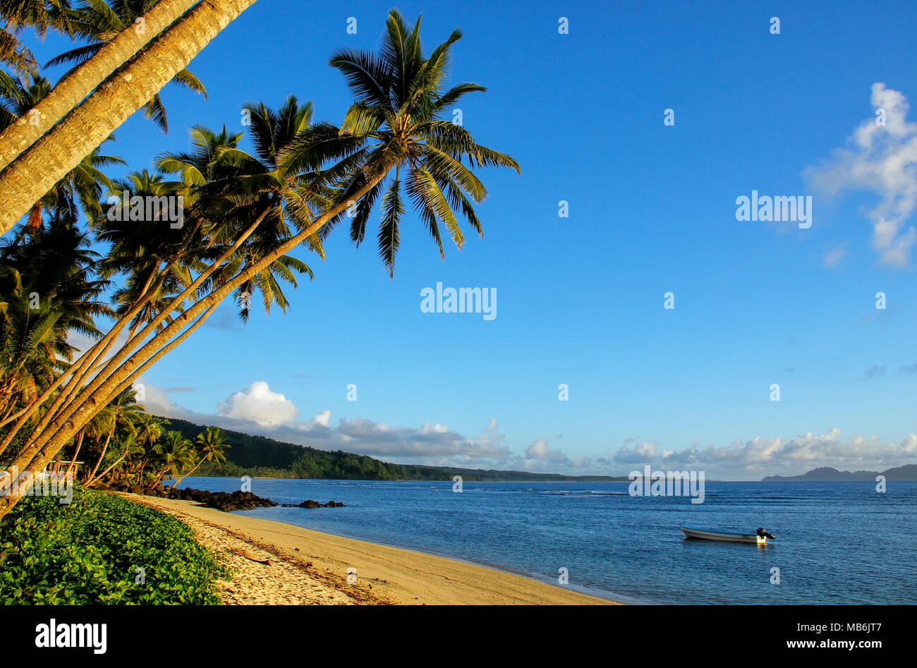 Sandy beach in Lavena village on Taveuni Island, Fiji. Taveuni is the ...