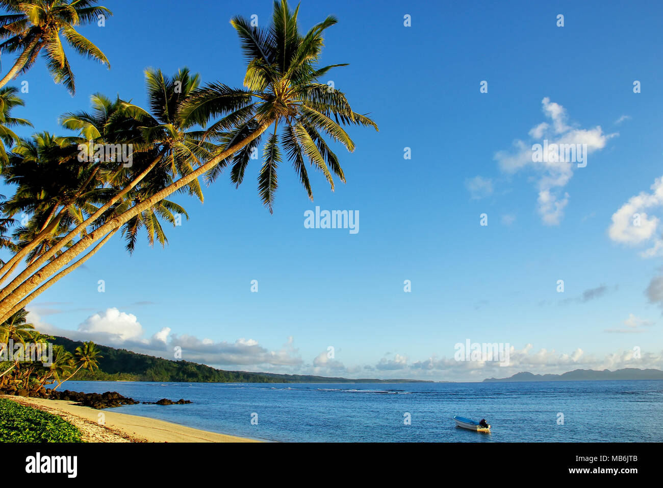 Sandy beach in Lavena village on Taveuni Island, Fiji. Taveuni is the ...