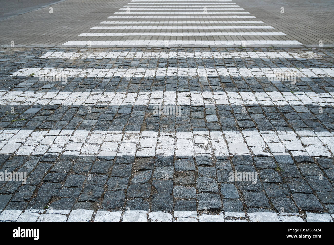 Urban street painted floor tiles, stone construction Stock Photo - Alamy
