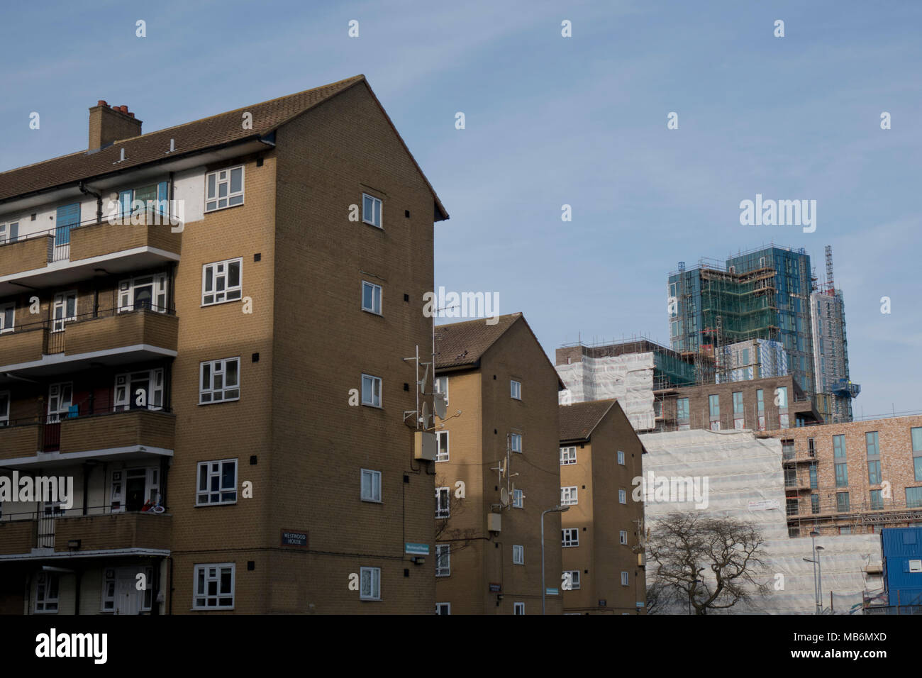 New luxury housing buildings next to old council housing stock by ...