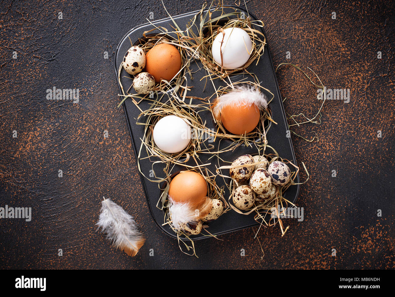 Fresh raw chicken and quail eggs in sieve Stock Photo - Alamy