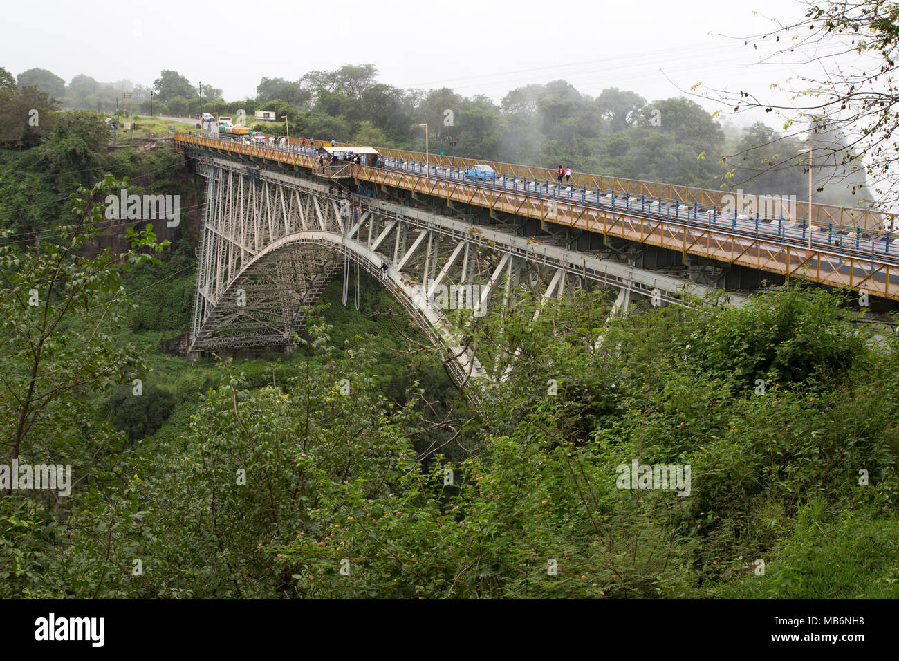 The arched frame of the Victoria Falls Bridge on the border of Zimbabwe ...