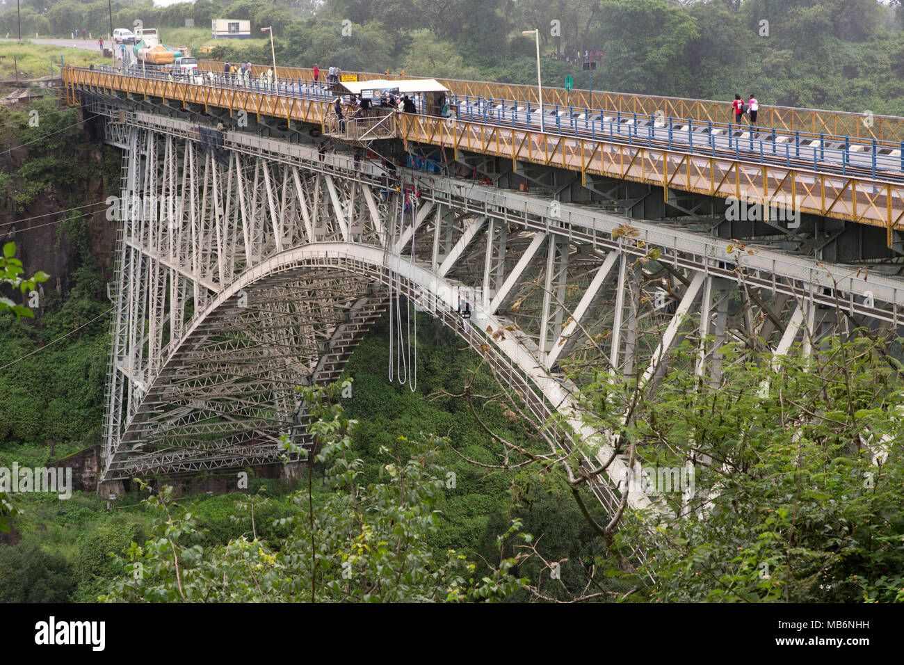 The arched frame of the Victoria Falls Bridge on the border of Zimbabwe ...