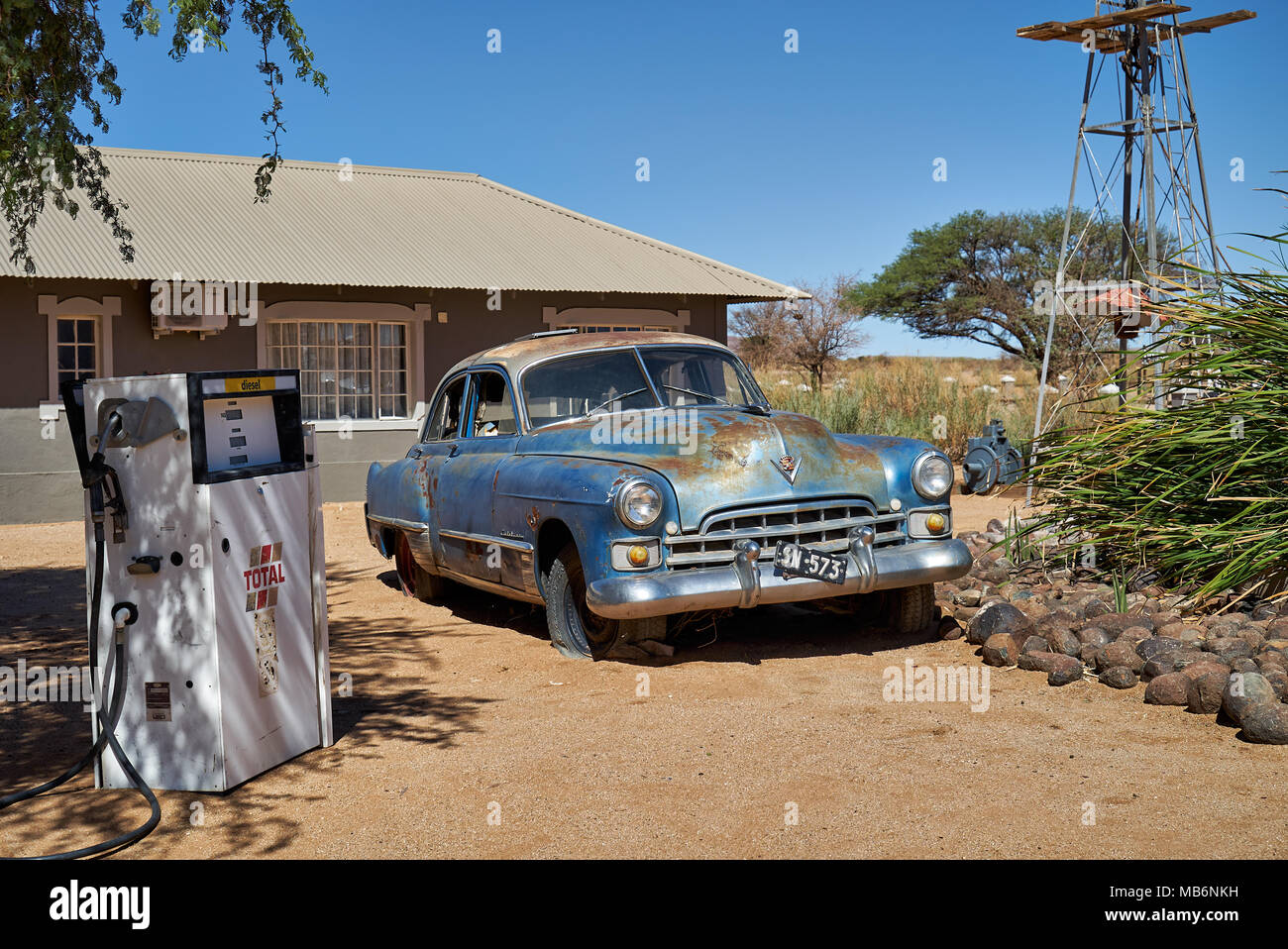 rusty classic car as decoration in Canyon Road House, Namibia, Africa ...