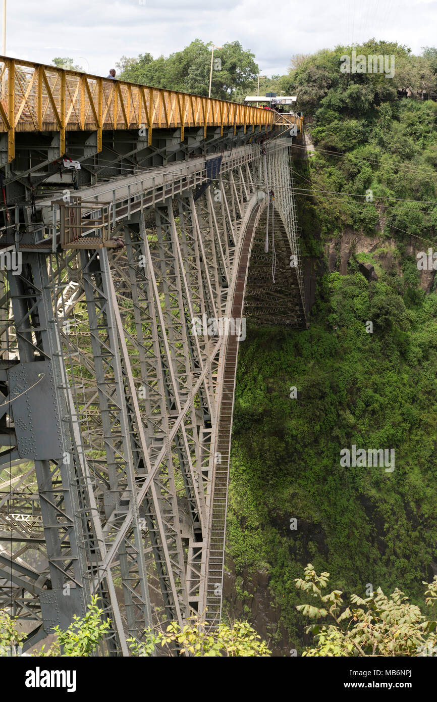 The arched frame of the Victoria Falls Bridge on the border of Zimbabwe ...