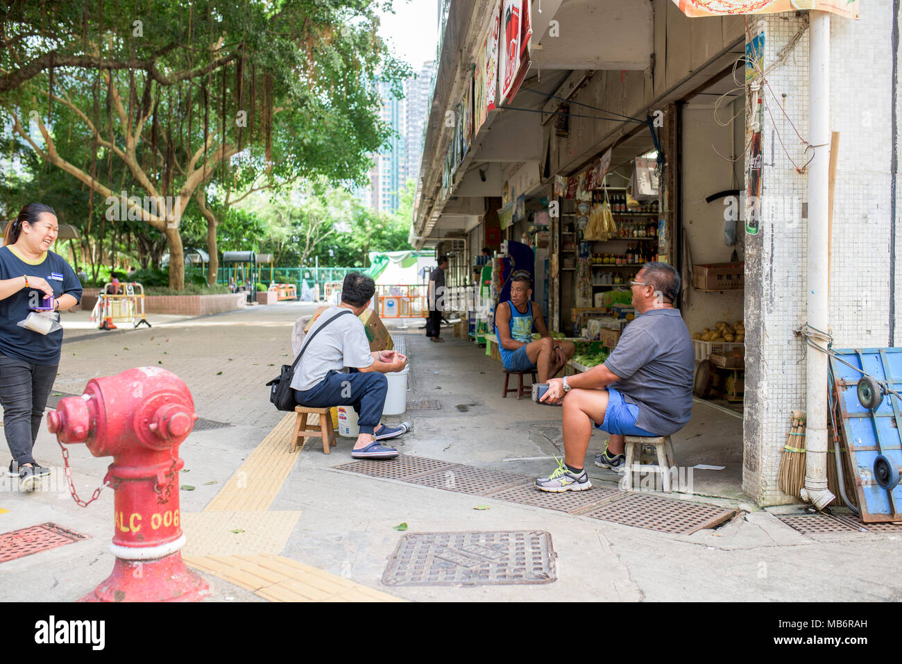China shop people sitting hi-res stock photography and images - Alamy