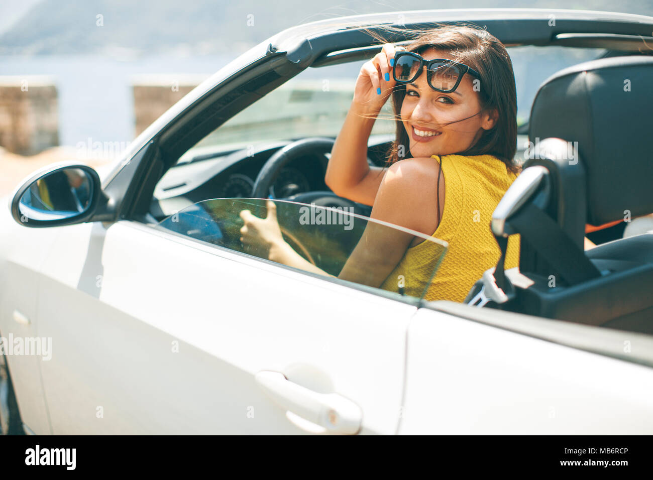 Young woman driving summer hi-res stock photography and images - Alamy