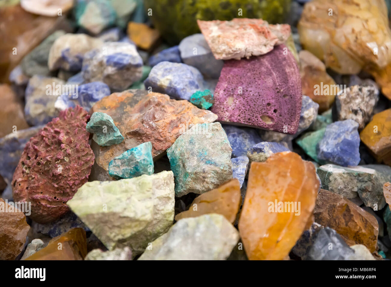 Detail of the pile of raw precious stones Stock Photo - Alamy
